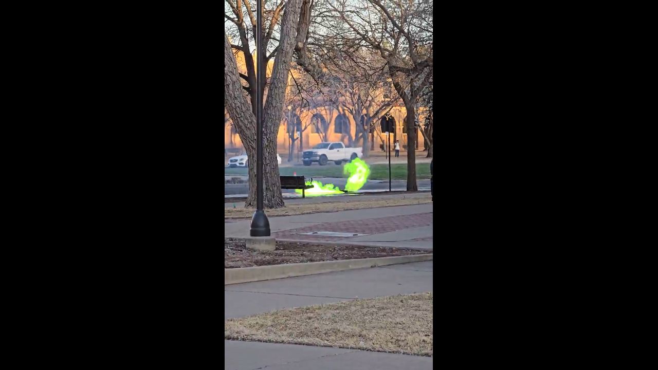 Brightly colored flames were seen shooting up from manholes at Texas ...